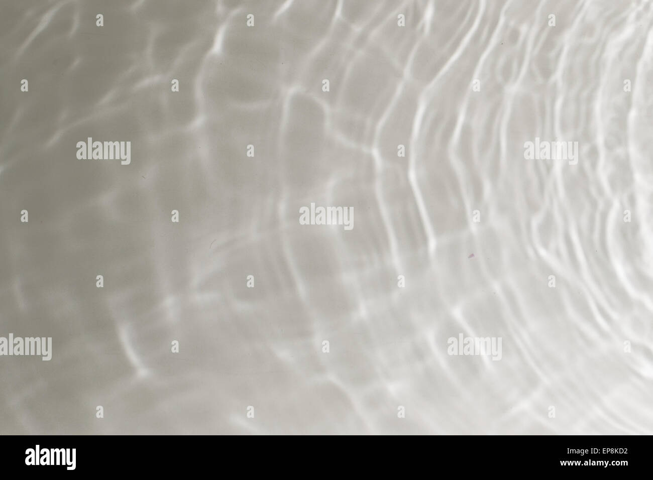 Ripples and small waves on the surface of bath water Stock Photo - Alamy