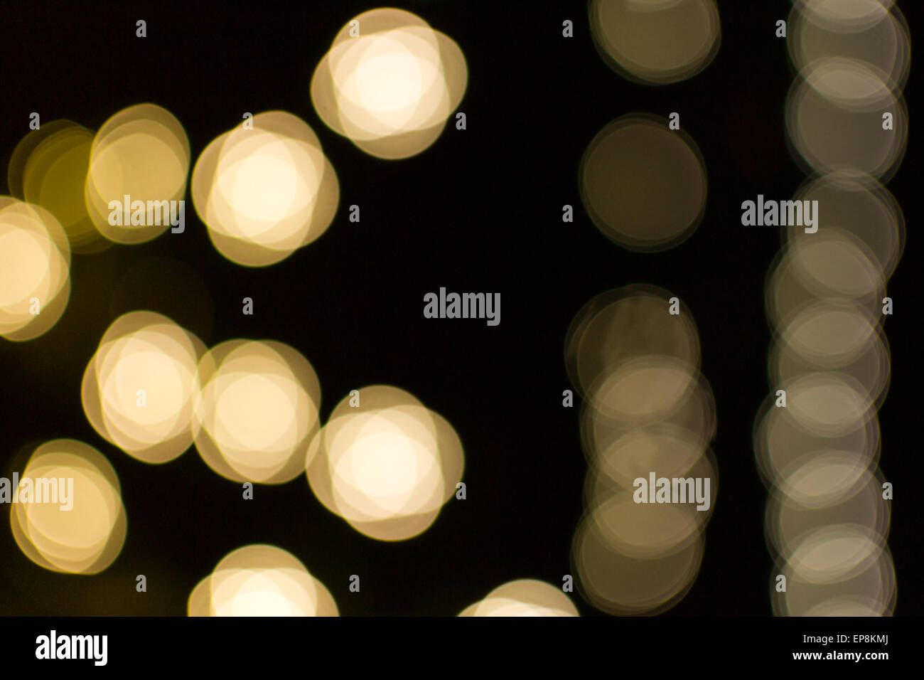 Fading Orange bokeh blurred light effect using a black background Stock ...