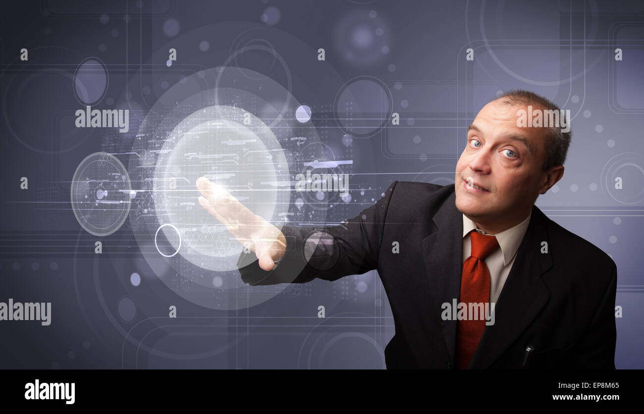 Businessman touching abstract high technology circular buttons Stock ...