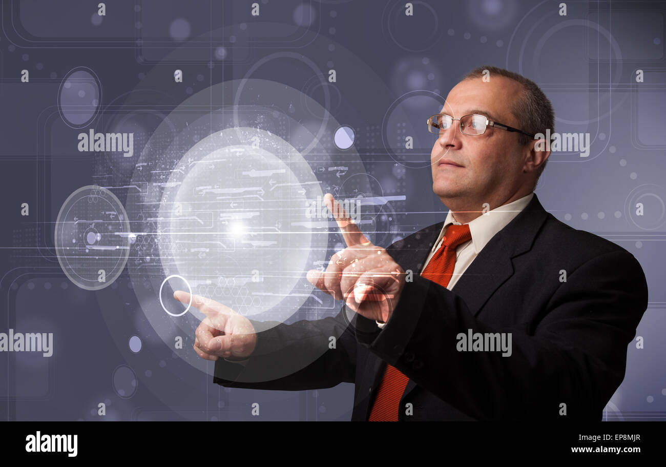 Businessman touching abstract high technology circular buttons Stock ...