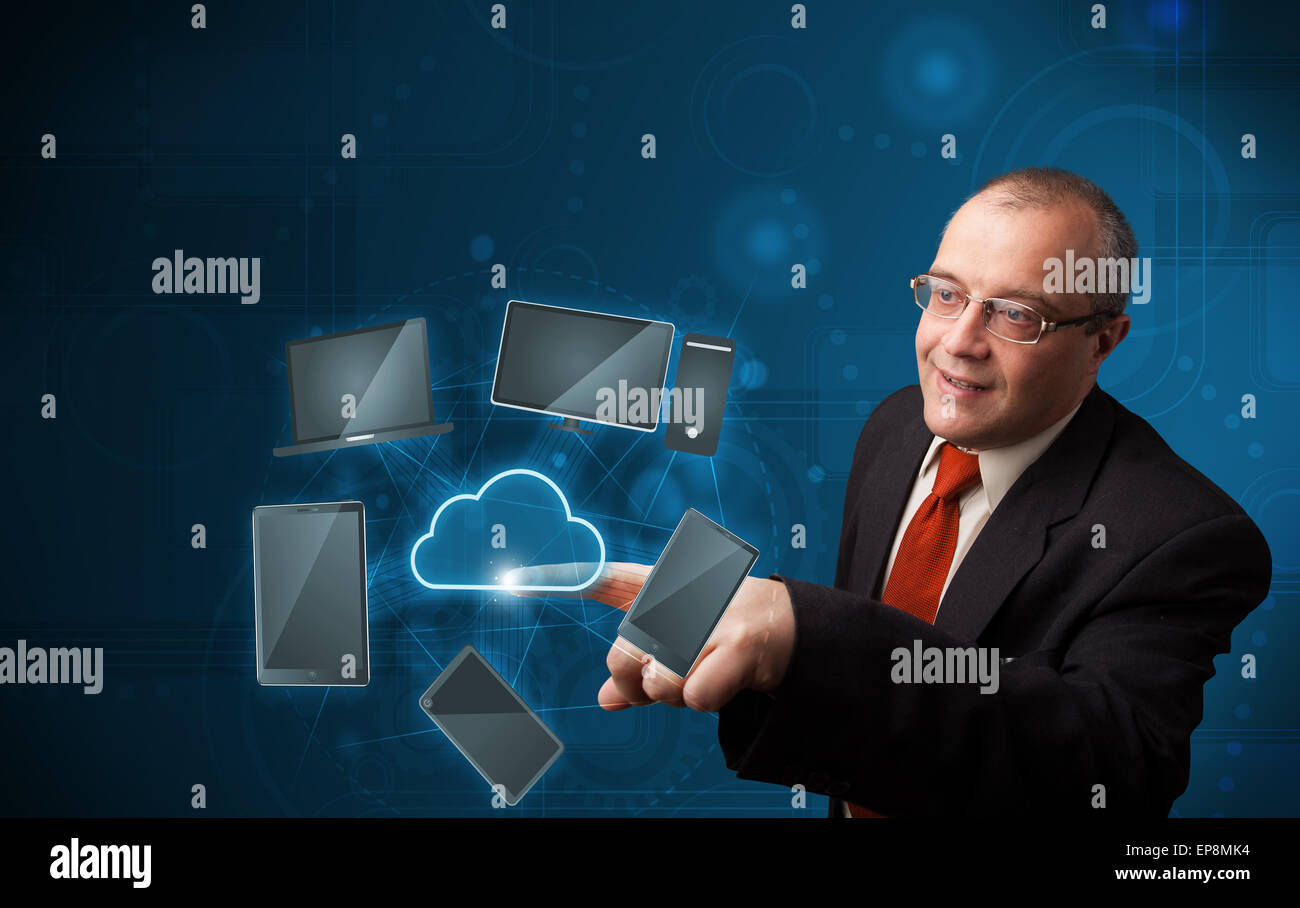 Businessman touching high technology cloud service Stock Photo - Alamy