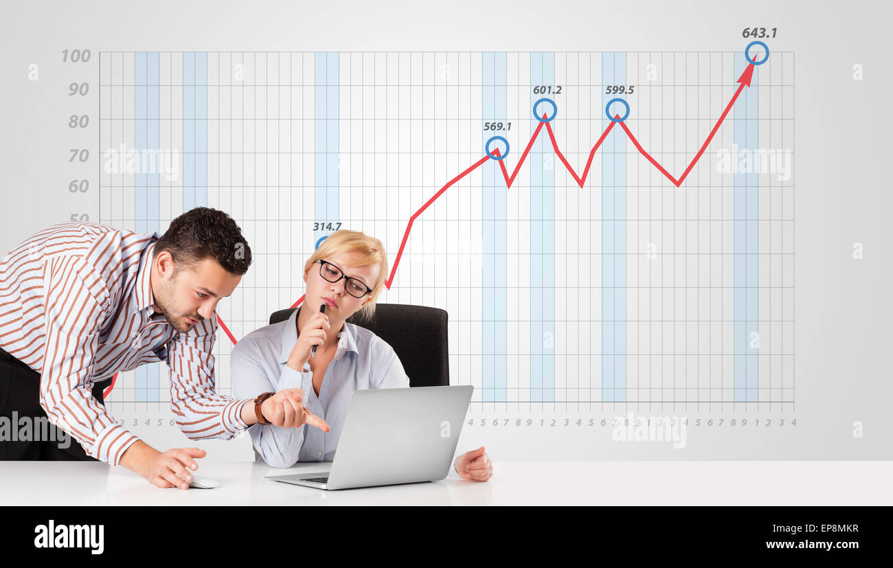 Businessman and businesswoman calculating stock market with rising ...