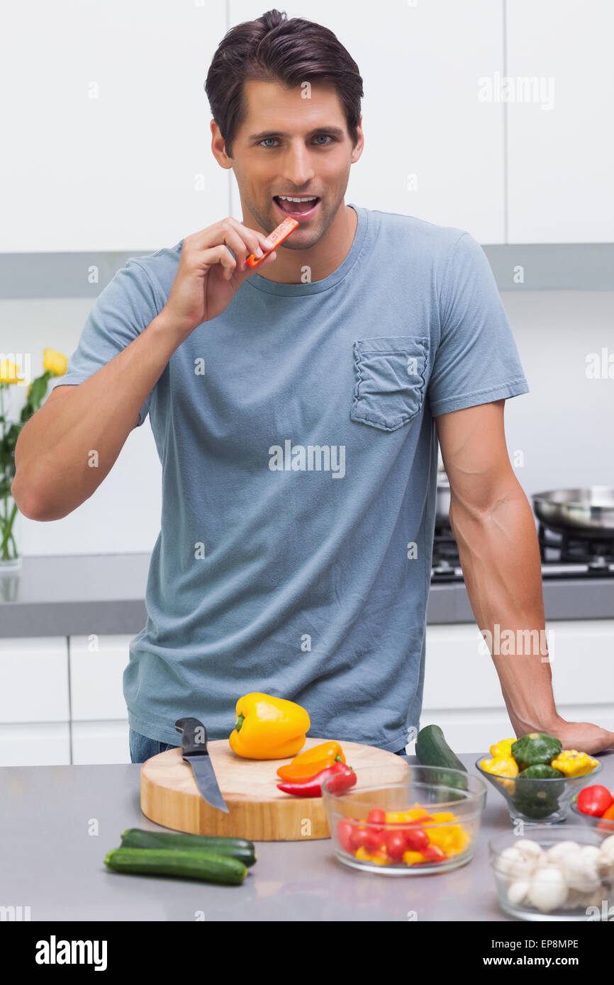 Biting a pepper hi-res stock photography and images - Alamy