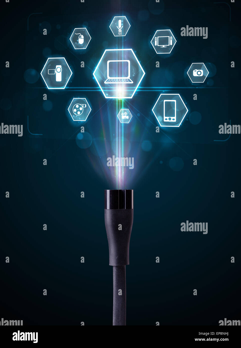 Electric cable with multimedia icons Stock Photo - Alamy