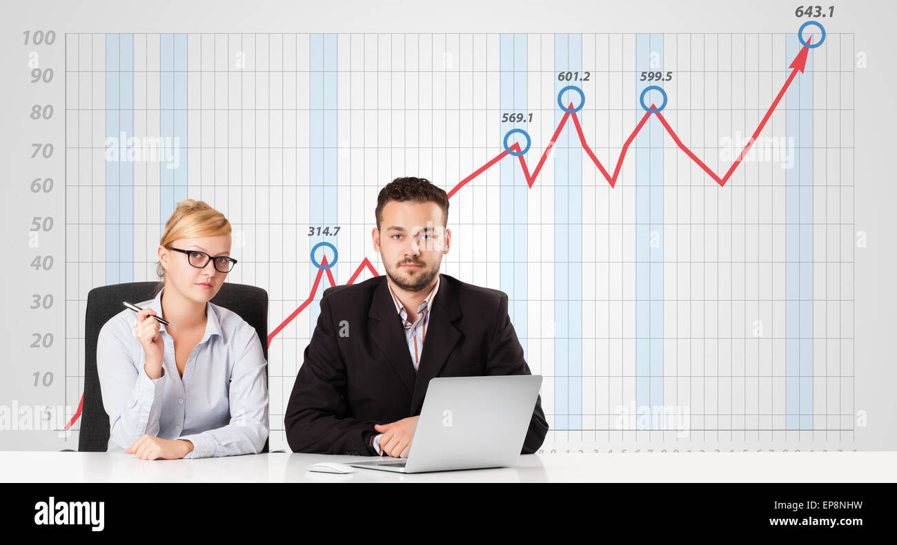 Businessman and businesswoman calculating stock market with rising ...