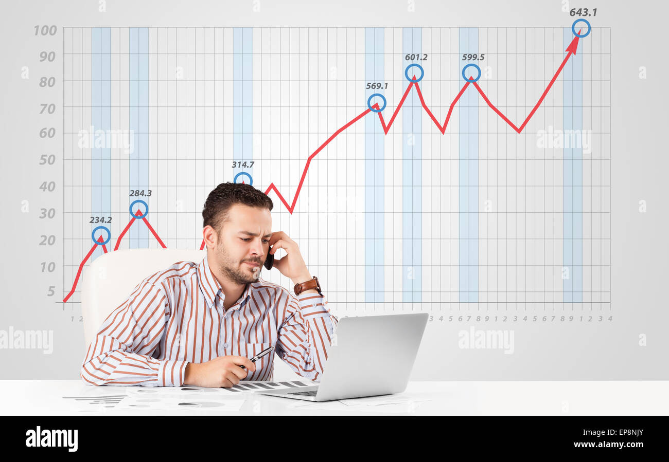 Businessman calculating stock market with rising graph in the ...