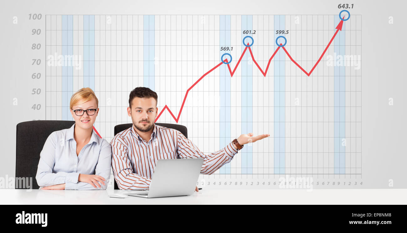 Businessman and businesswoman calculating stock market with rising ...