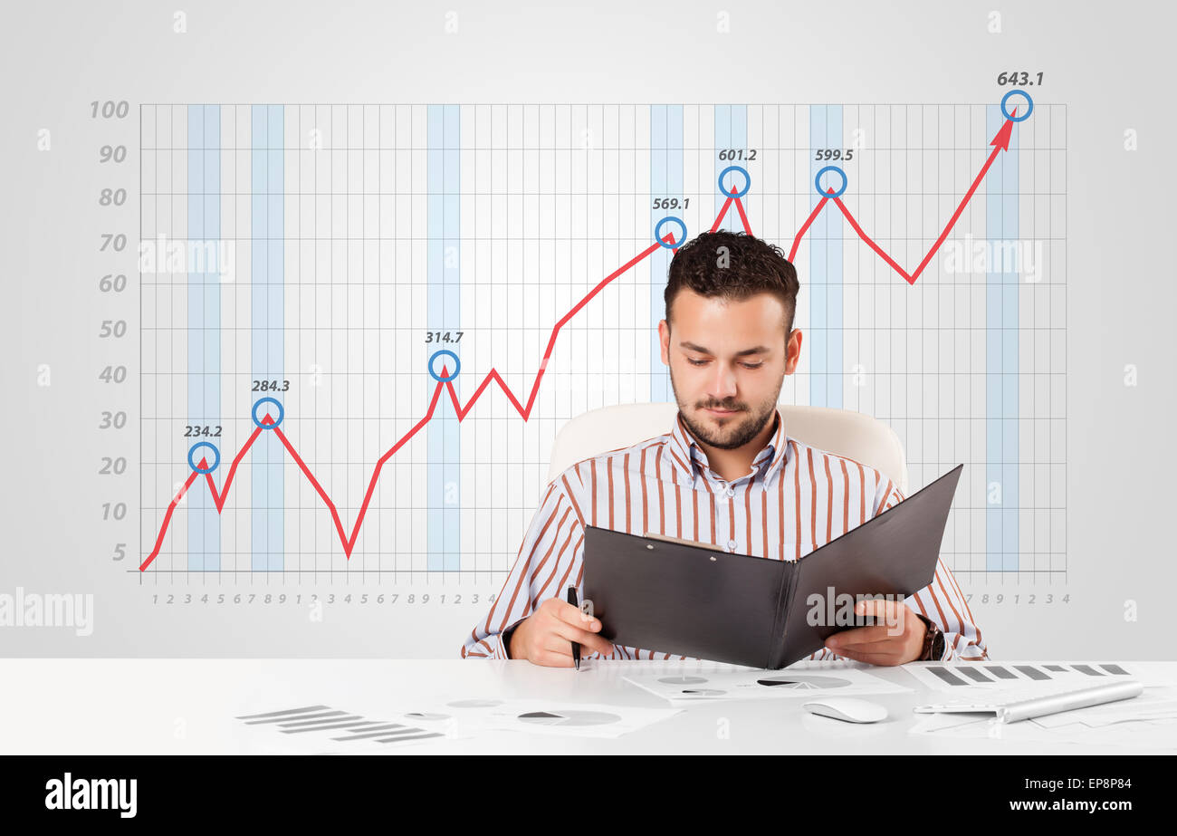 Businessman calculating stock market with rising graph in the ...