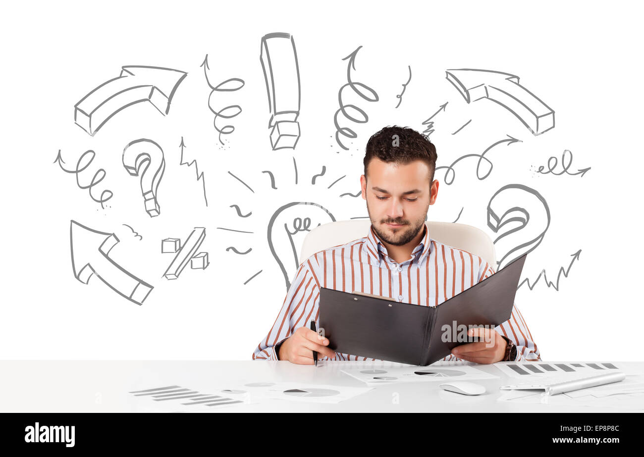 Young businessman brainstorming with drawn arrows and symbols Stock ...