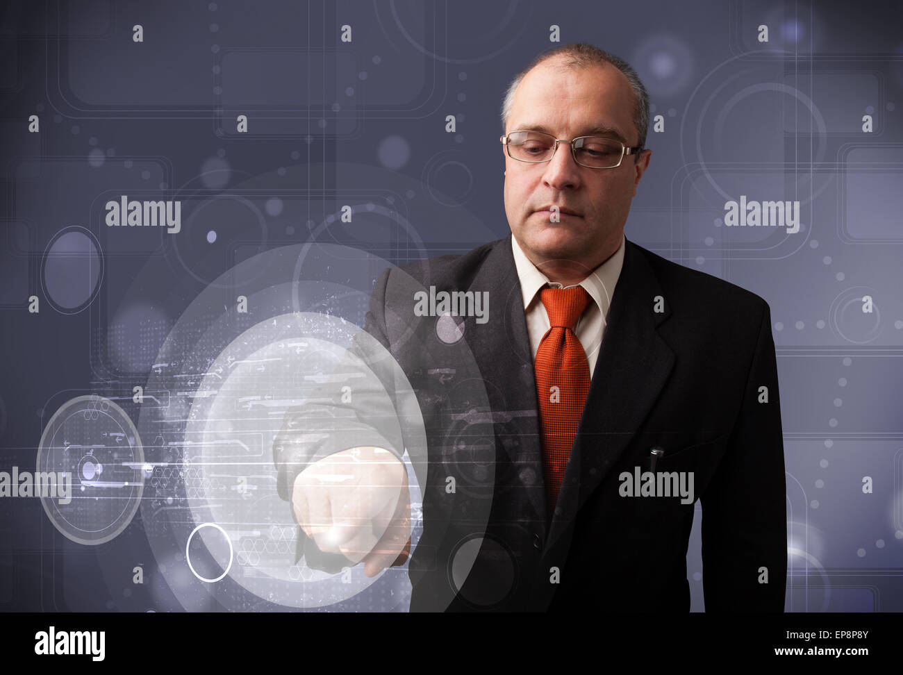 Businessman touching abstract high technology circular buttons Stock ...