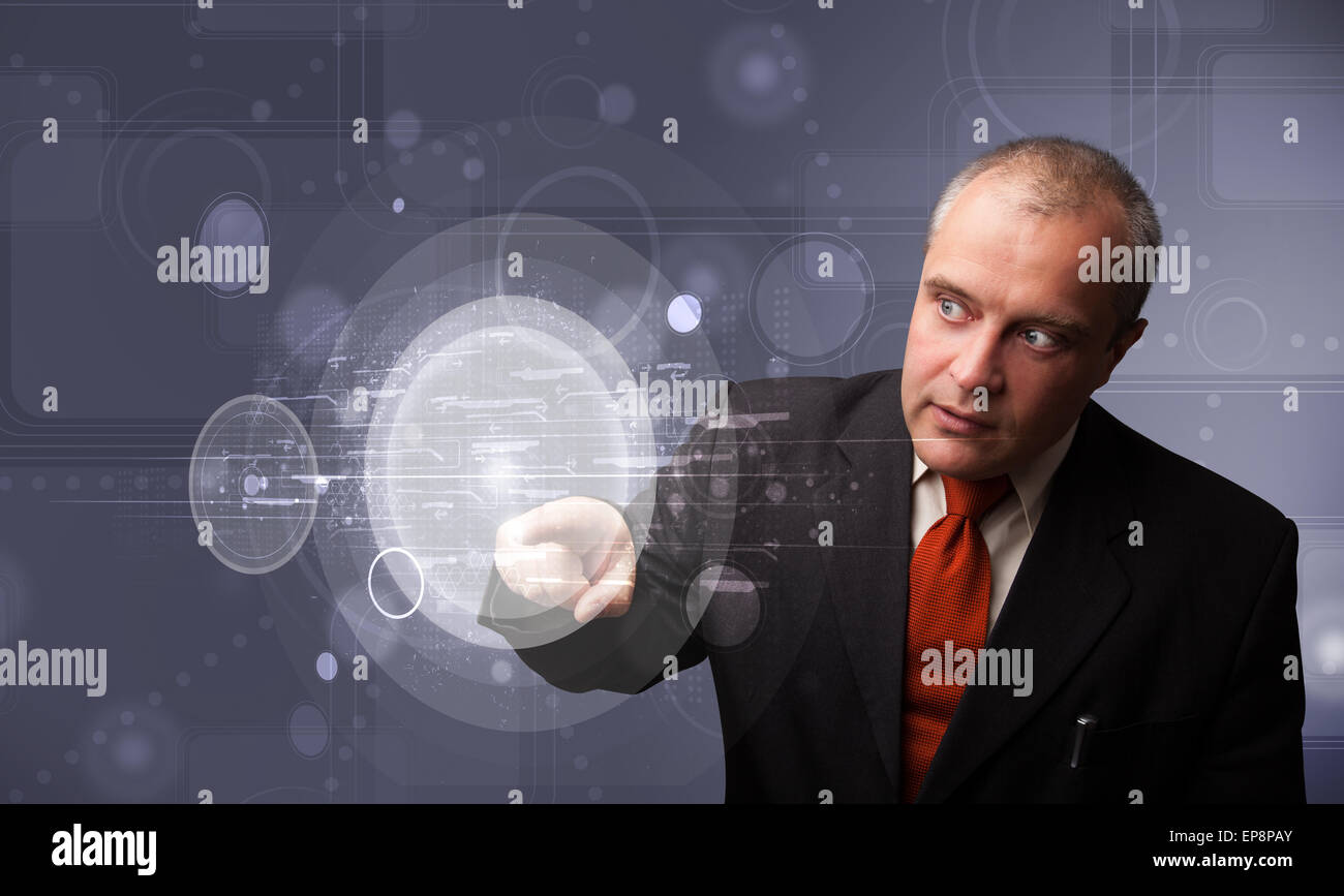 Businessman touching abstract high technology circular buttons Stock ...