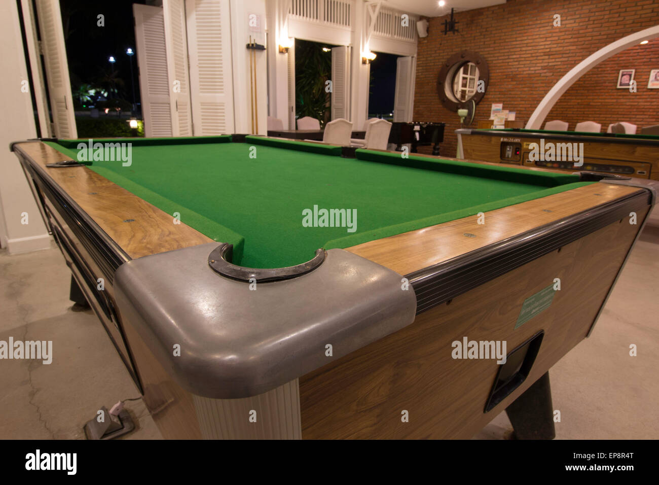 living room with a Billiard table Stock Photo - Alamy