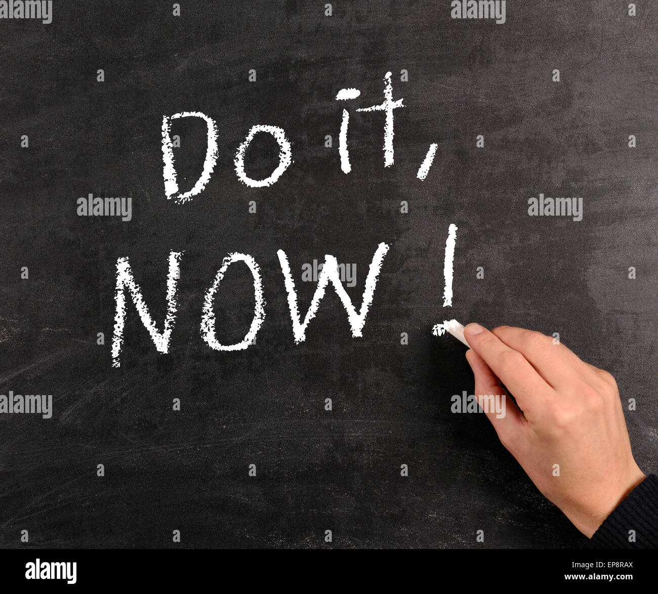 Hand writing Do it , Now! with chalk on a blackboard Stock Photo - Alamy