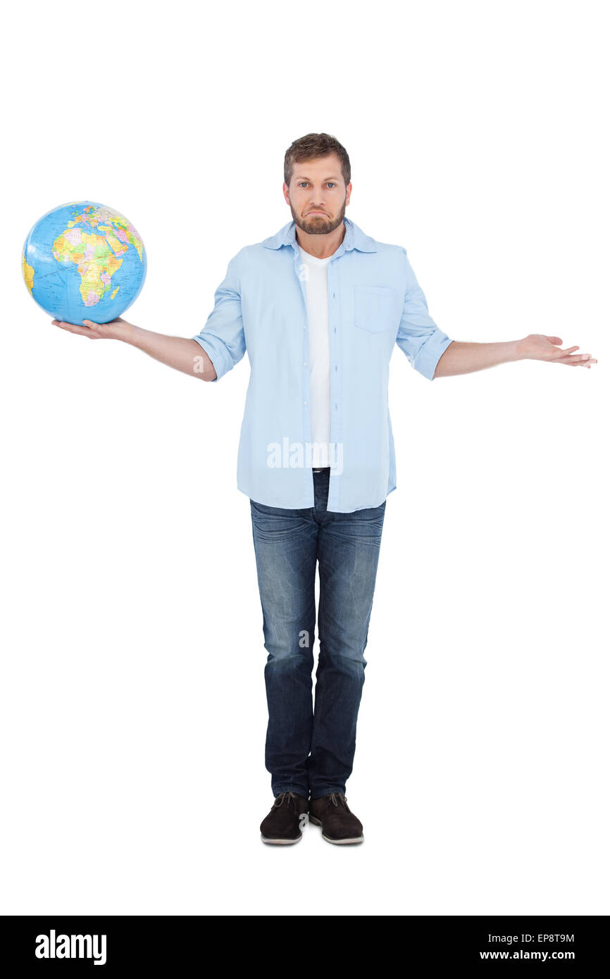 Charming model holding a globe and making faces Stock Photo - Alamy Charming model holding a globe and making faces Stock Photo - Alamy