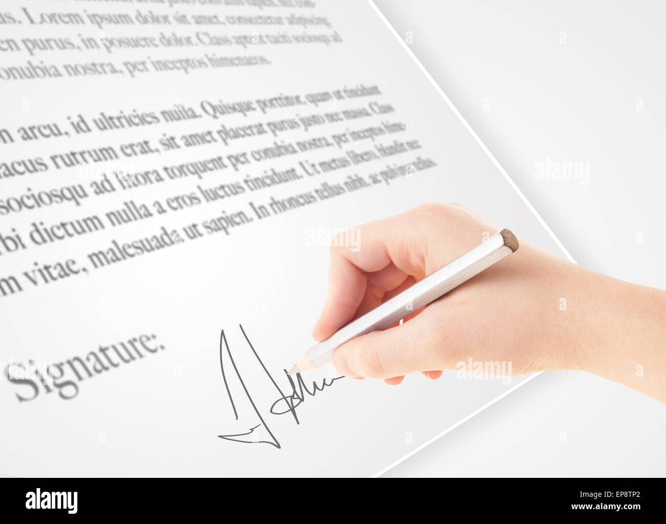 Hand writing personal signature on a paper form Stock Photo - Alamy