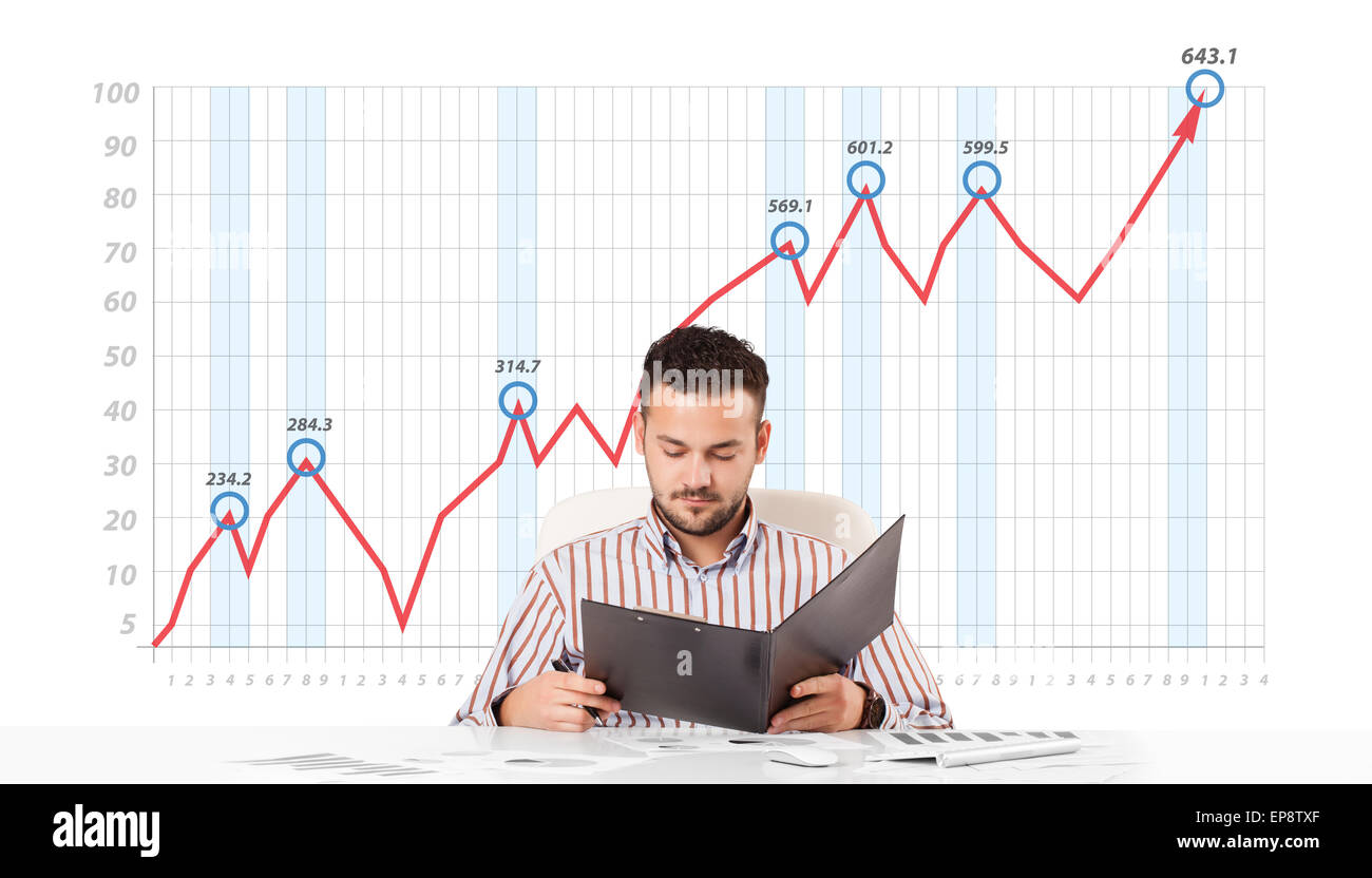 Businessman calculating stock market with rising graph in the ...