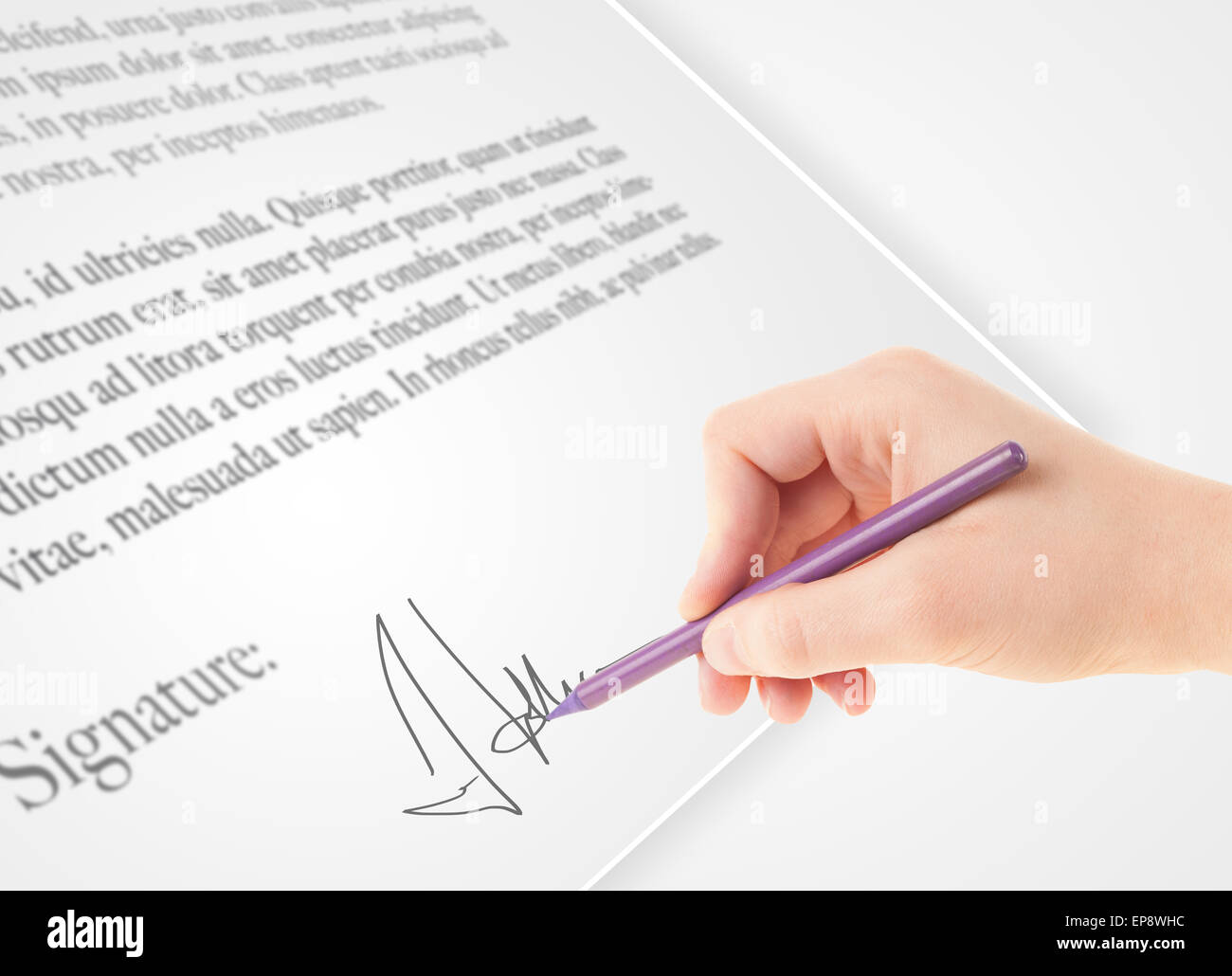Hand writing personal signature on a paper form Stock Photo - Alamy