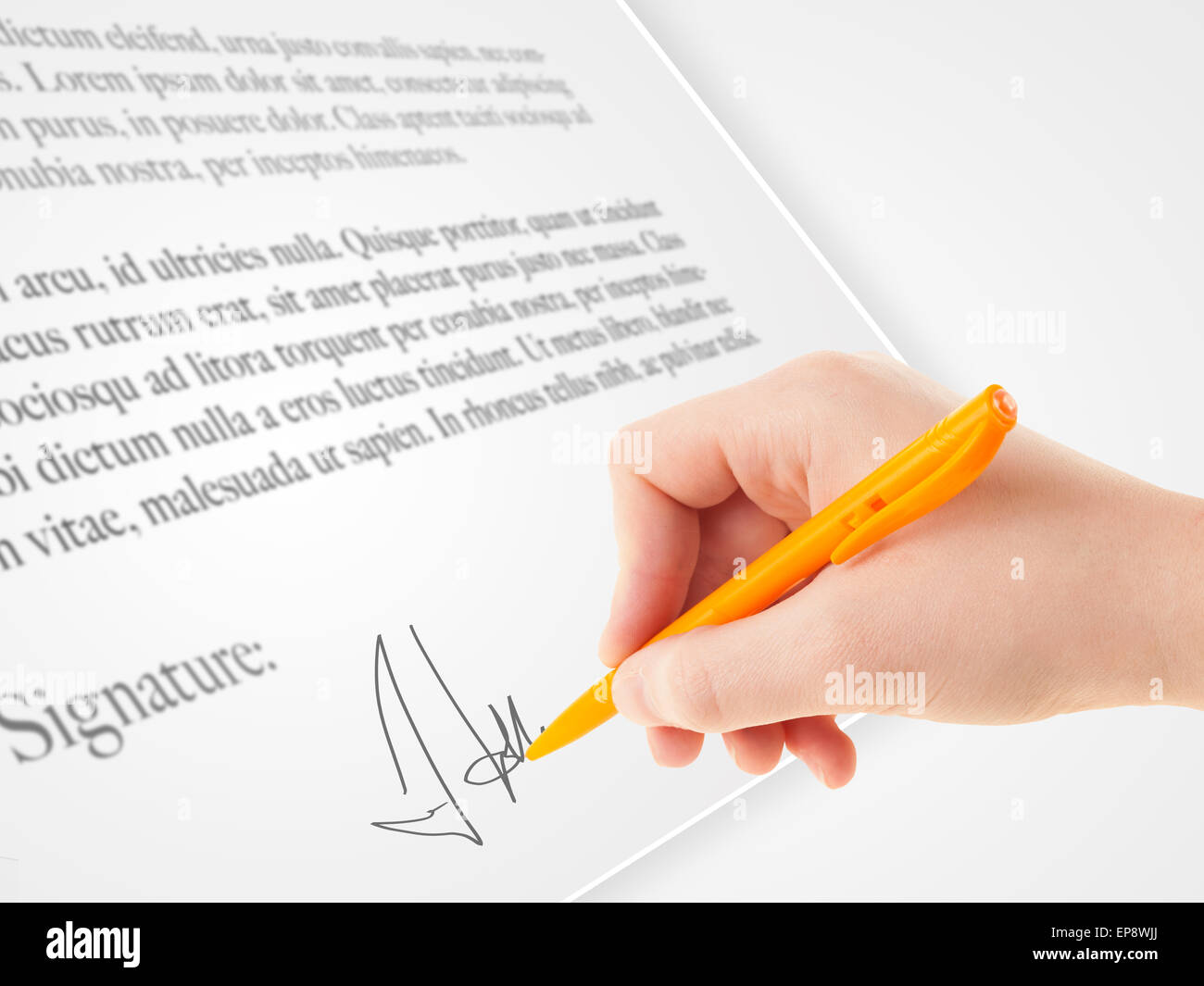 Hand writing personal signature on a paper form Stock Photo - Alamy