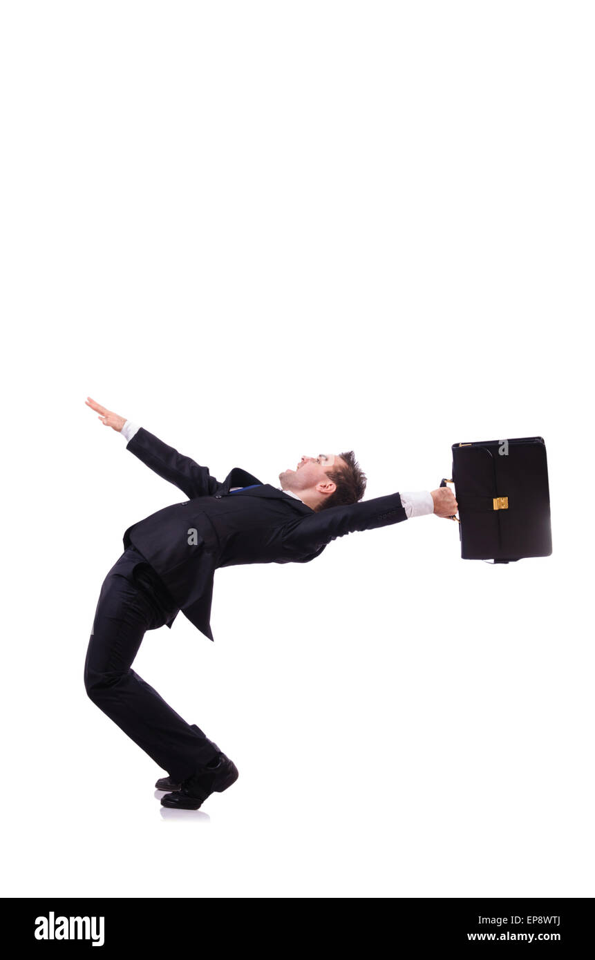 Funny businessman being blown by wind Stock Photo - Alamy