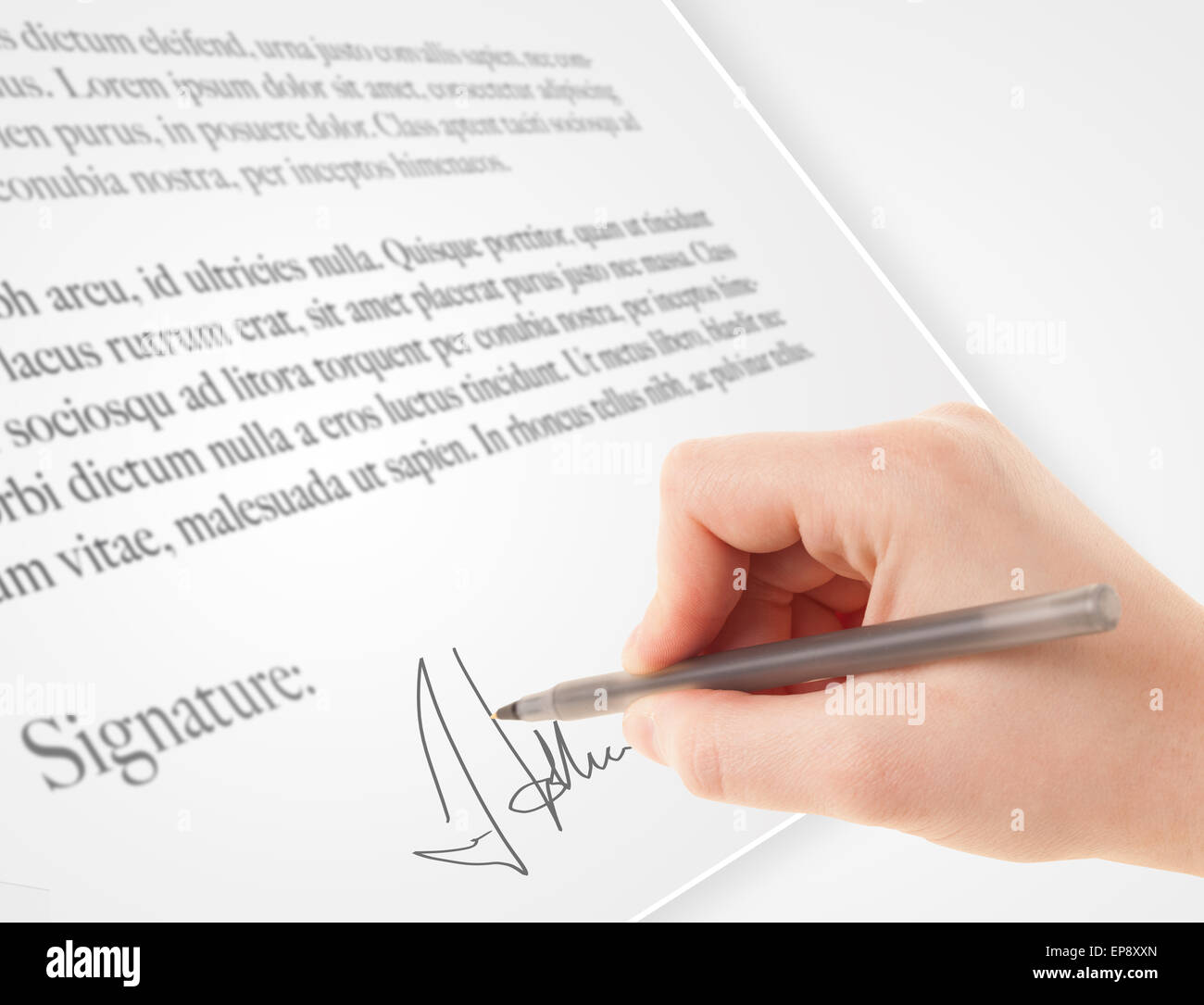 Hand writing personal signature on a paper form Stock Photo - Alamy