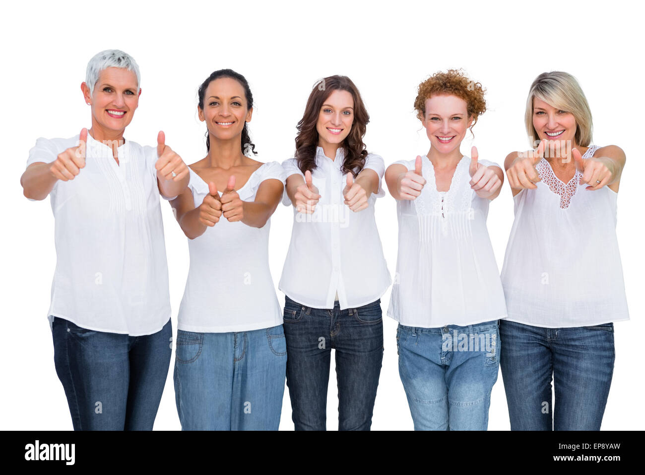 Cheerful casual models posing together with thumbs up Stock Photo - Alamy