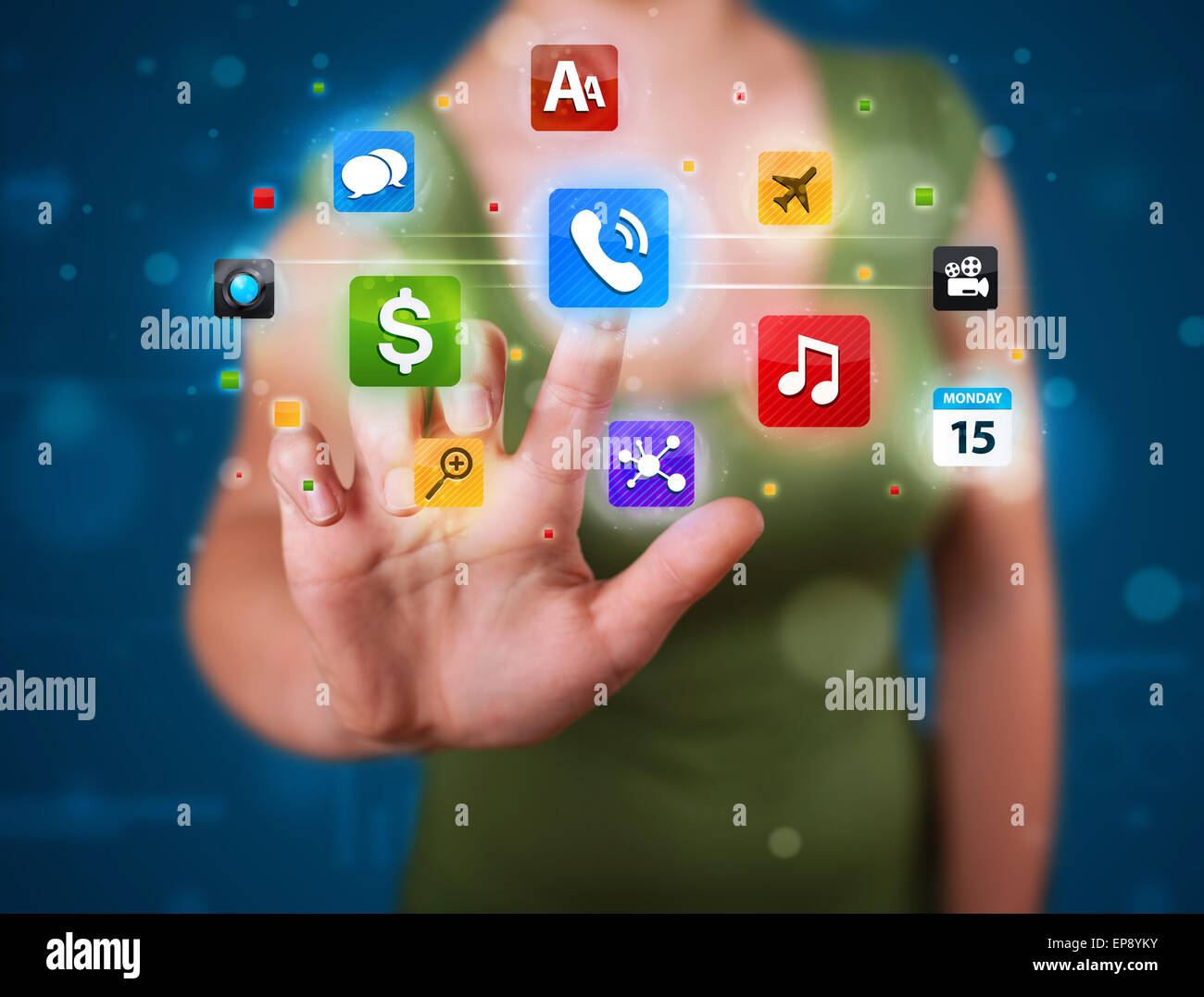 Woman pressing various collection of high tech buttons Stock Photo - Alamy