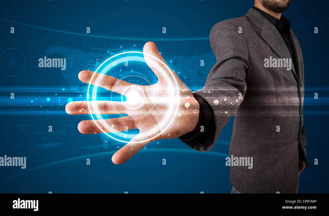 Businessman pressing high tech type of modern buttons Stock Photo - Alamy