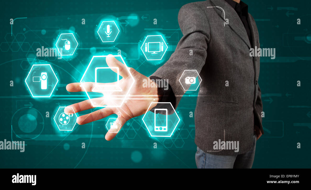 Businessman pressing virtual media type of buttons Stock Photo - Alamy