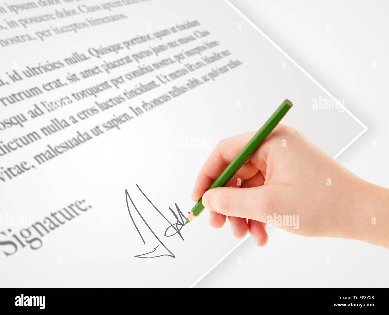 Hand writing personal signature on a paper form Stock Photo - Alamy