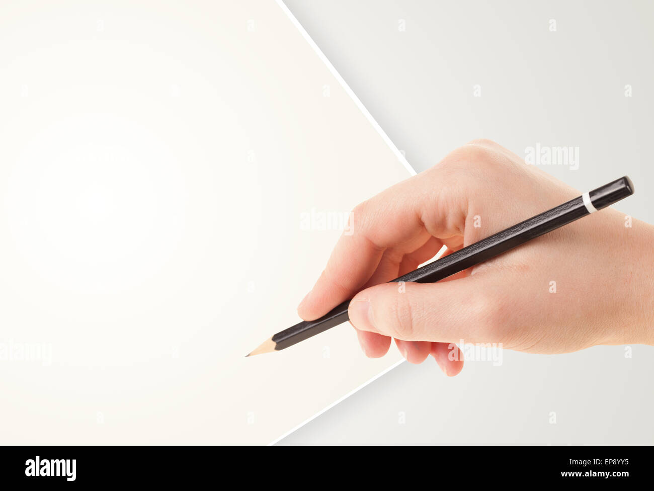 Human hand drawing with pencil on empty paper template Stock Photo - Alamy