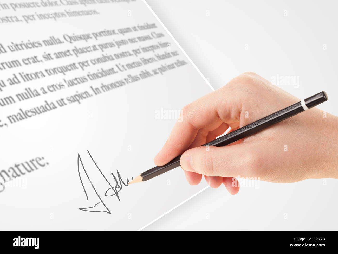 Hand writing personal signature on a paper form Stock Photo - Alamy