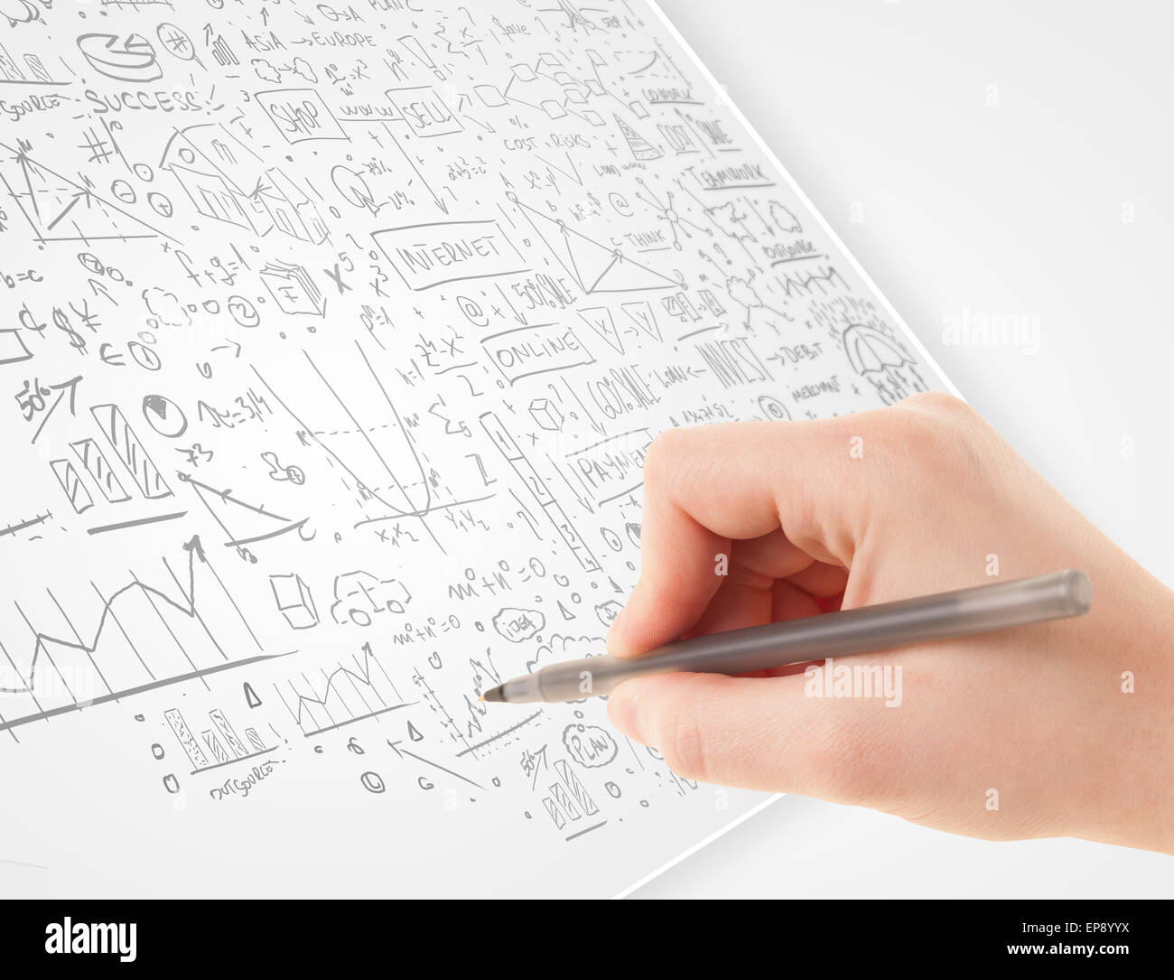 Human hand sketching ideas on a white paper Stock Photo - Alamy