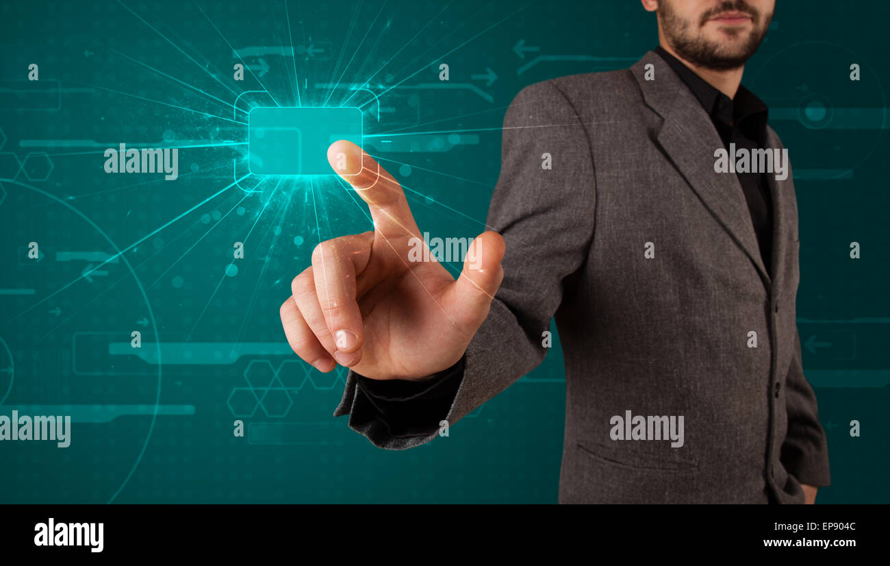 Businessman pressing high tech type of modern buttons Stock Photo - Alamy
