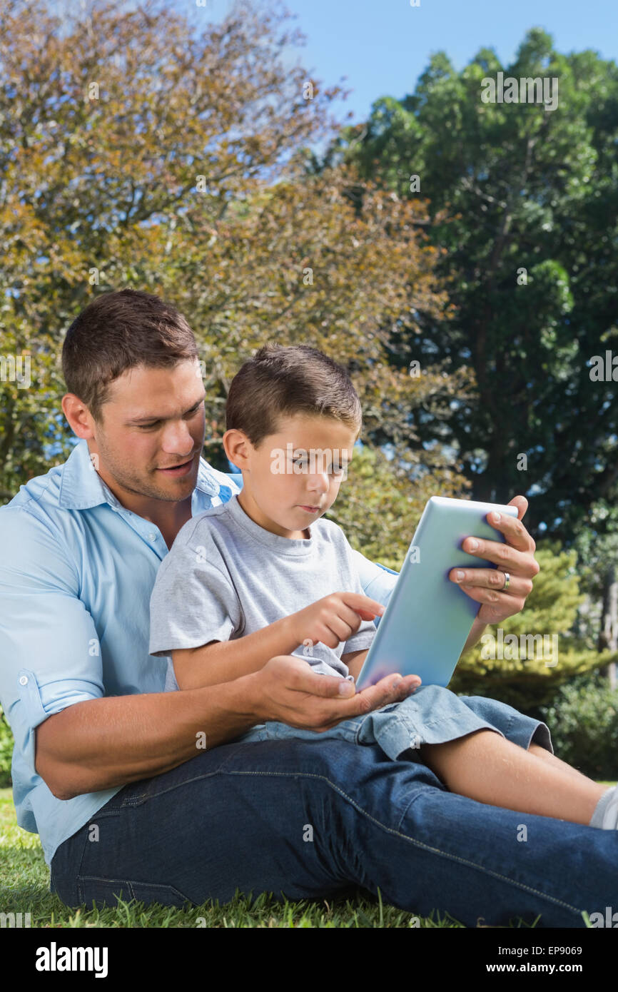 Happy dad son tablet pc hi-res stock photography and images - Alamy