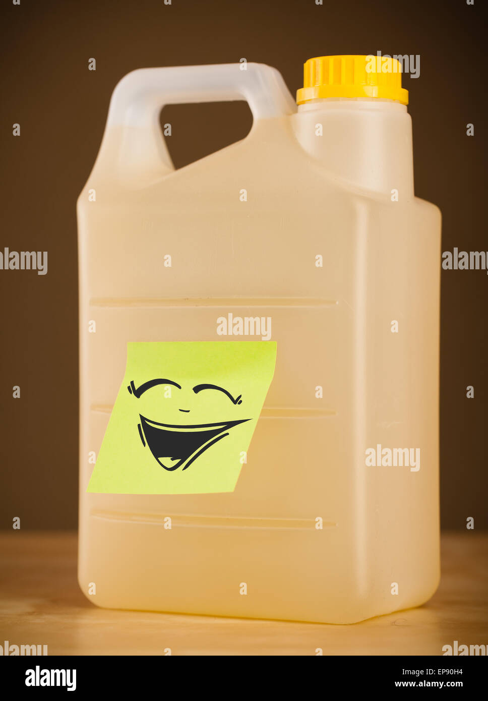 Post-it note with smiley face sticked on gallon Stock Photo - Alamy