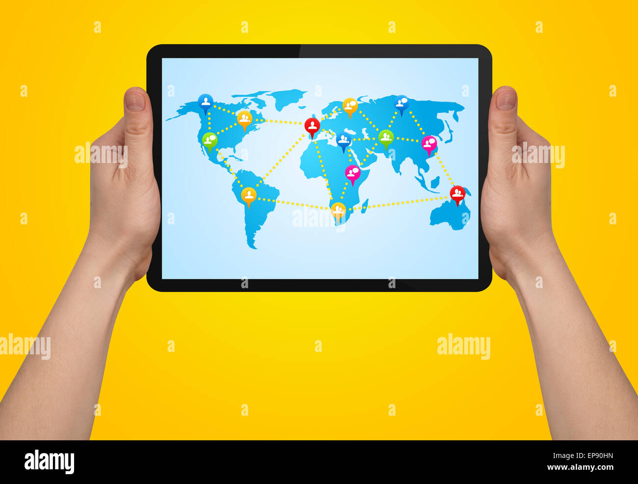 a male hand holding a modern touchpad with social map Stock Photo - Alamy