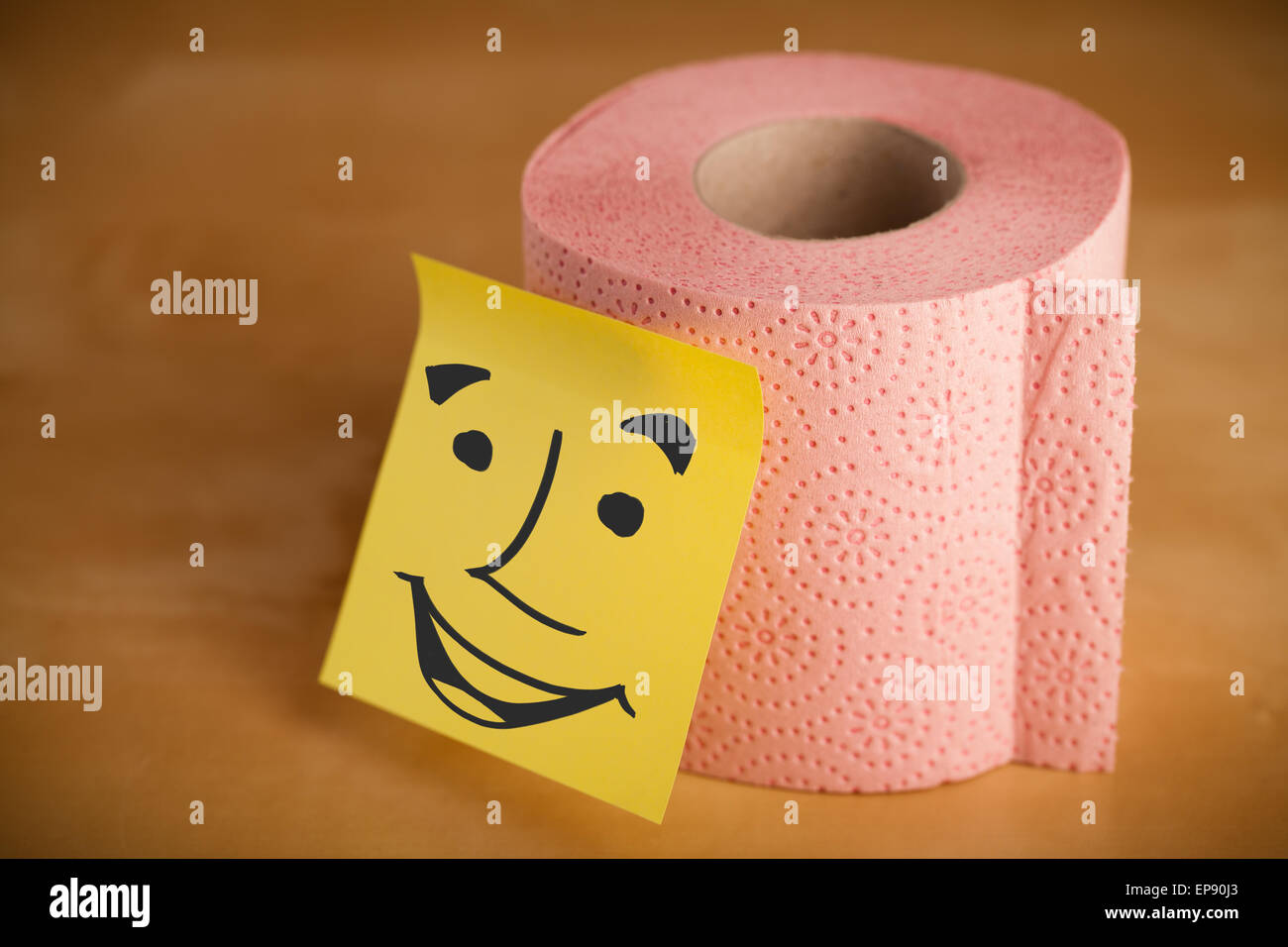 Post-it note with smiley face sticked on a toilet paper Stock Photo - Alamy
