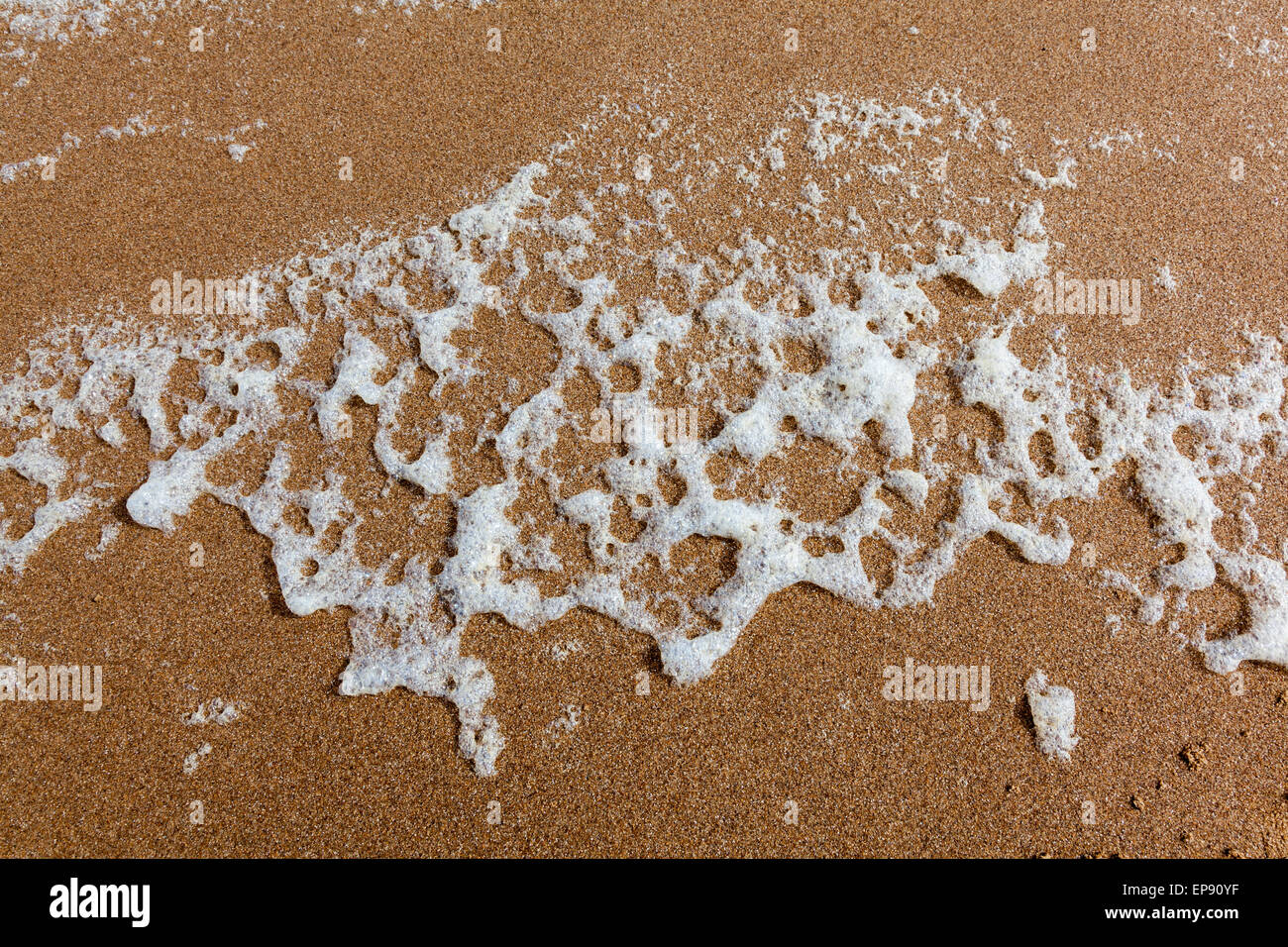 Foam on the sandy beach at Joss Bay, Broadstairs, Kent, England, UK ...