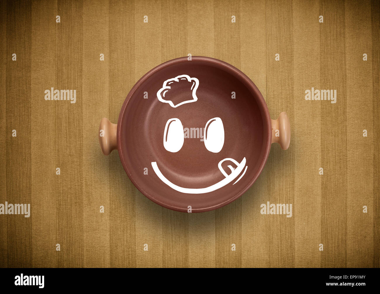 Happy smiley cartoon face on colorful dish plate Stock Photo - Alamy
