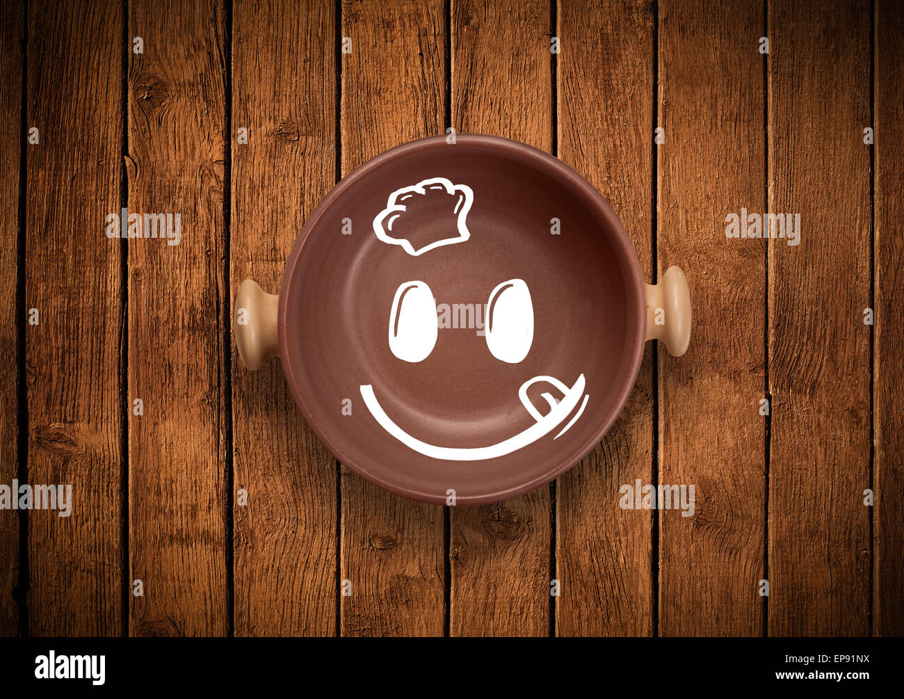 Happy smiley cartoon face on colorful dish plate Stock Photo - Alamy