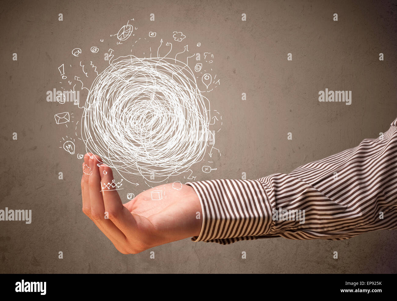 Chaos concept in the hand of a businessman Stock Photo - Alamy