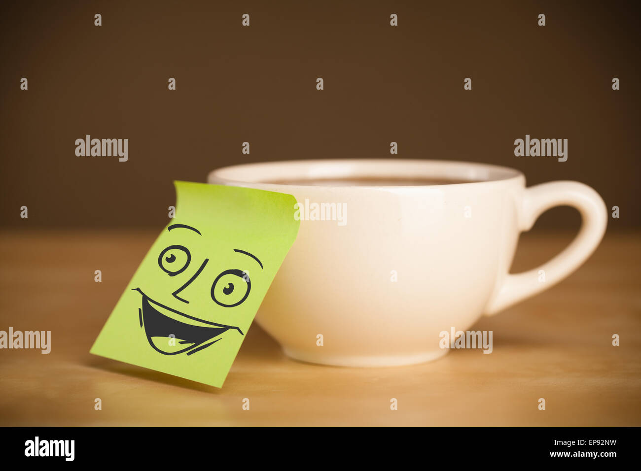 Post-it note with smiley face sticked on a cup Stock Photo - Alamy