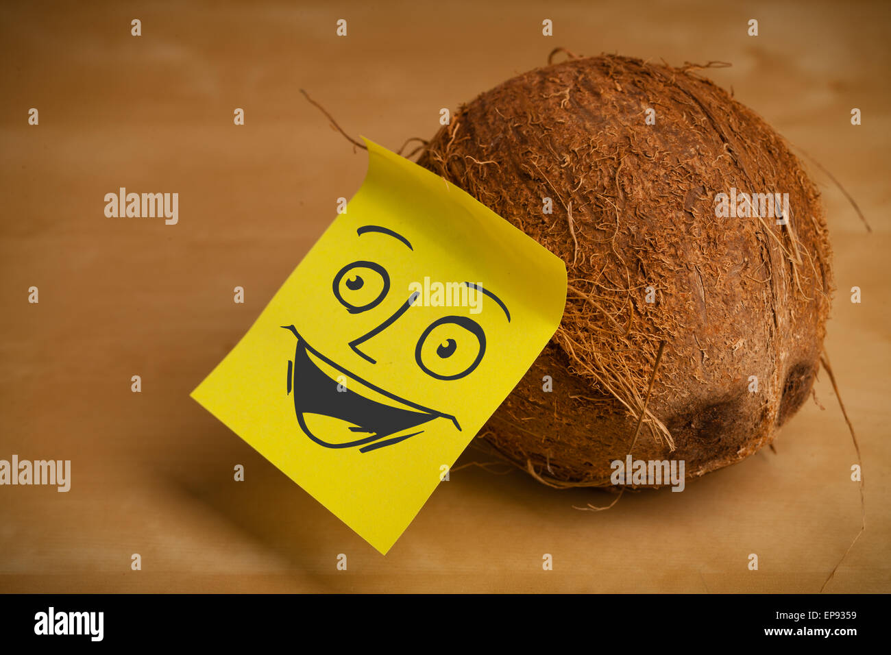 Post-it note with smiley face sticked on a coconut Stock Photo - Alamy