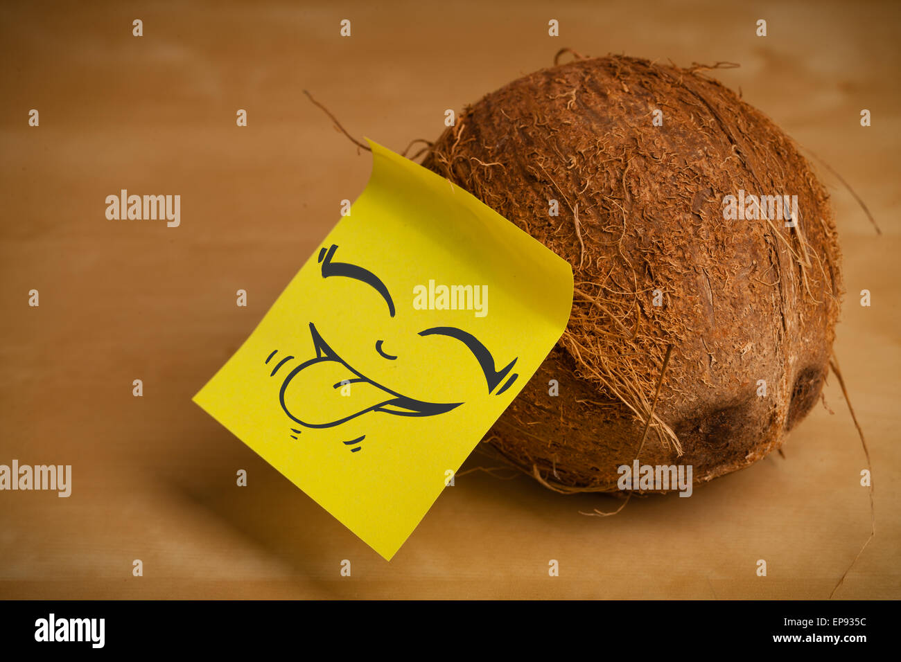 Post-it note with smiley face sticked on a coconut Stock Photo - Alamy