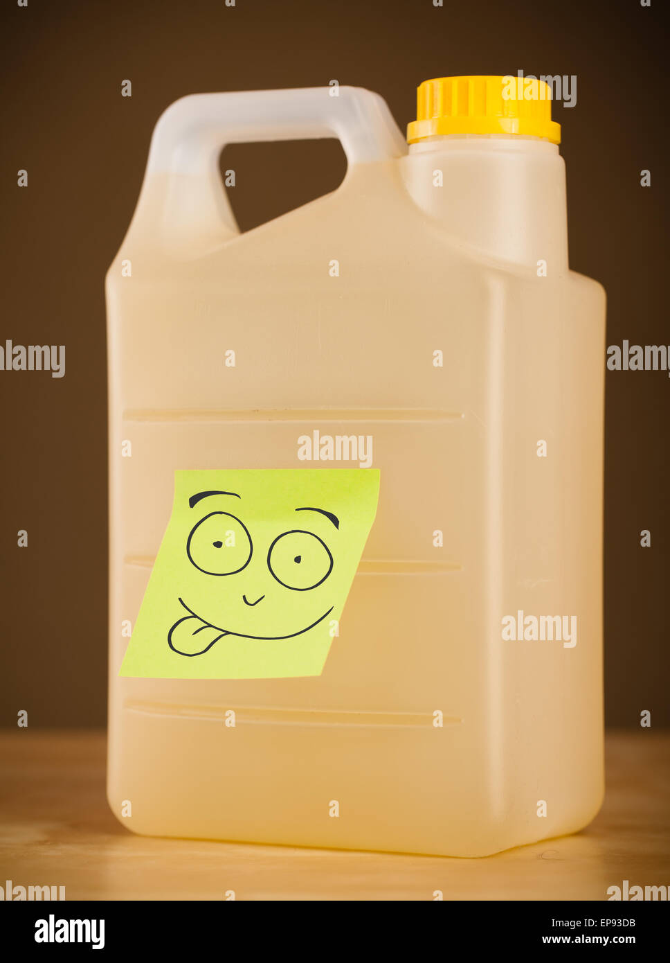 Post-it note with smiley face sticked on a can Stock Photo - Alamy