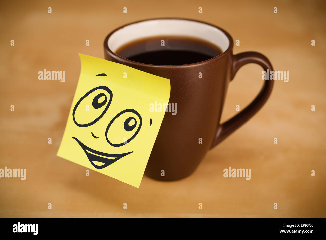 Post-it note with smiley face sticked on cup Stock Photo - Alamy