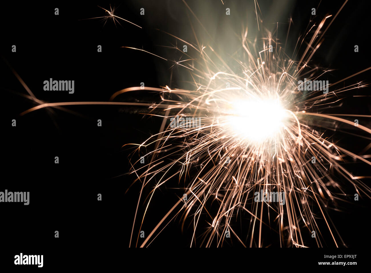 flare of the cracker on black background Stock Photo - Alamy