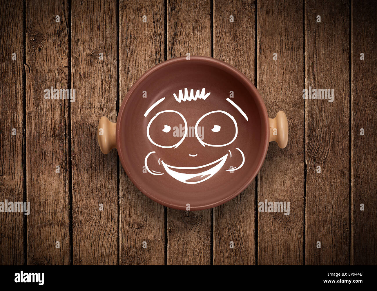 Happy smiley cartoon face on colorful dish plate Stock Photo - Alamy