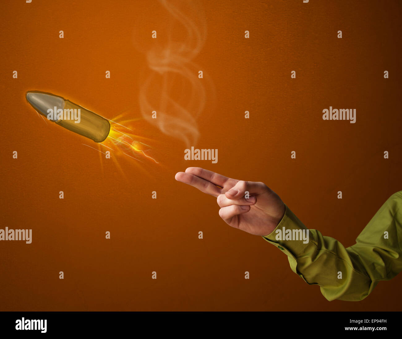 Gun shaped male hand with bullet Stock Photo - Alamy