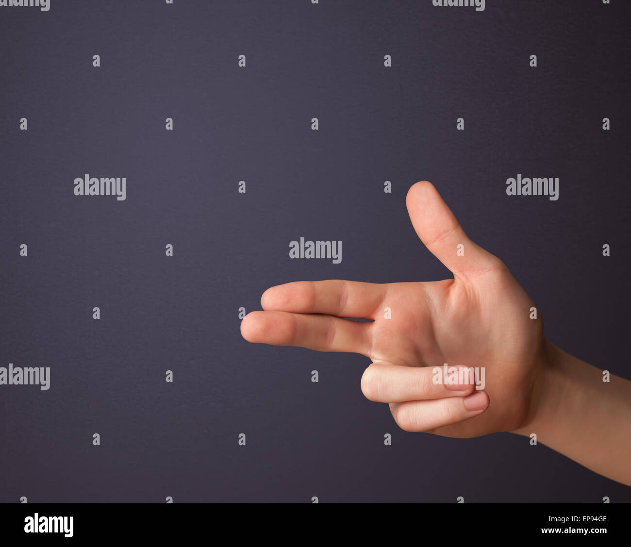 Gun shaped man hand Stock Photo - Alamy